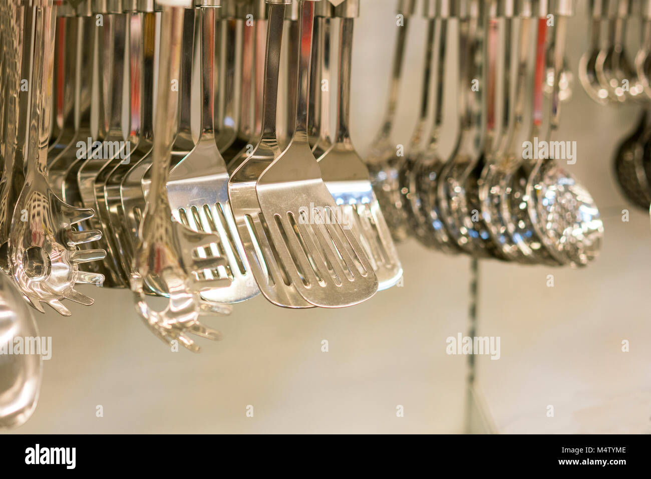 Metal kitchen appliances on the shelf in the store Stock Photo - Alamy