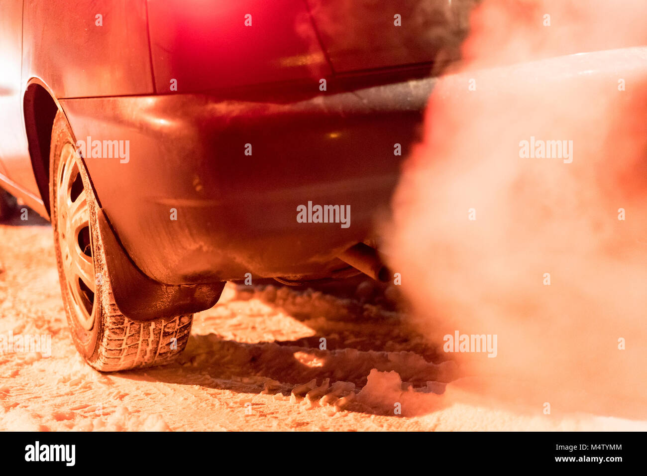 smoke from the exhaust pipe of the car. Environmental pollution by ...