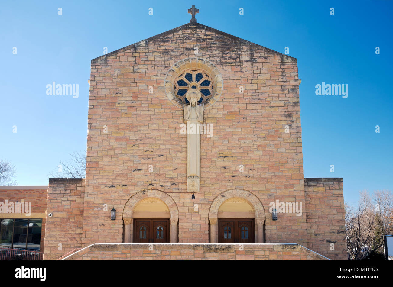 church nave exterior and double door entrances in west saint paul ...