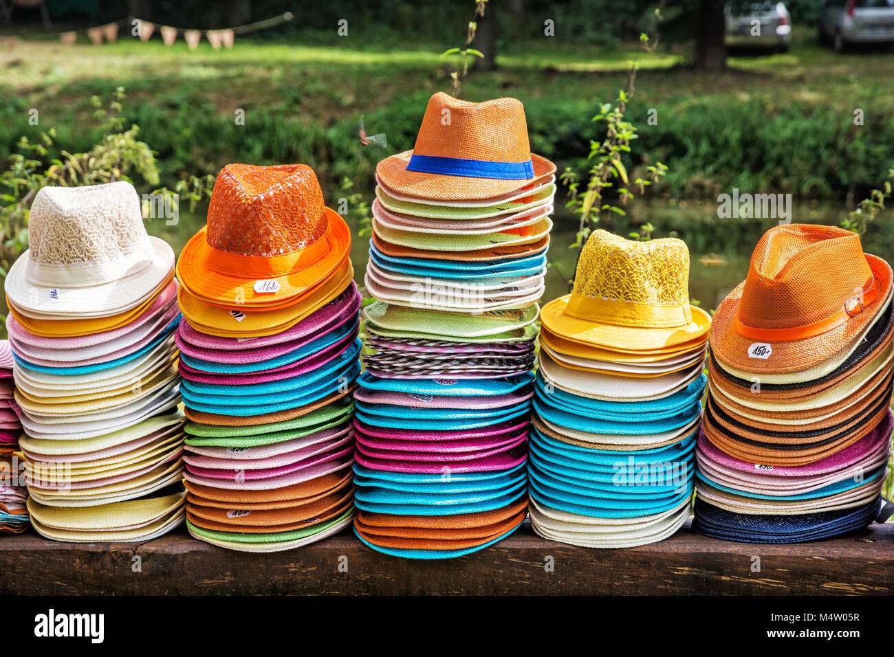 Colorful collection of hats in the shop. Summer fashion Stock Photo - Alamy