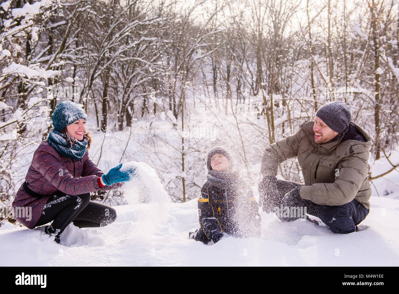 Beauty Winter Girl Blowing Snow in frosty winter Park. Outdoors Stock ...