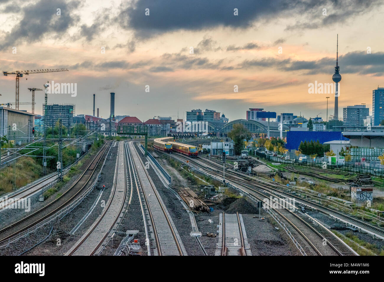 Berlin metro railway tracks with TV Tower in background Stock Photo - Alamy