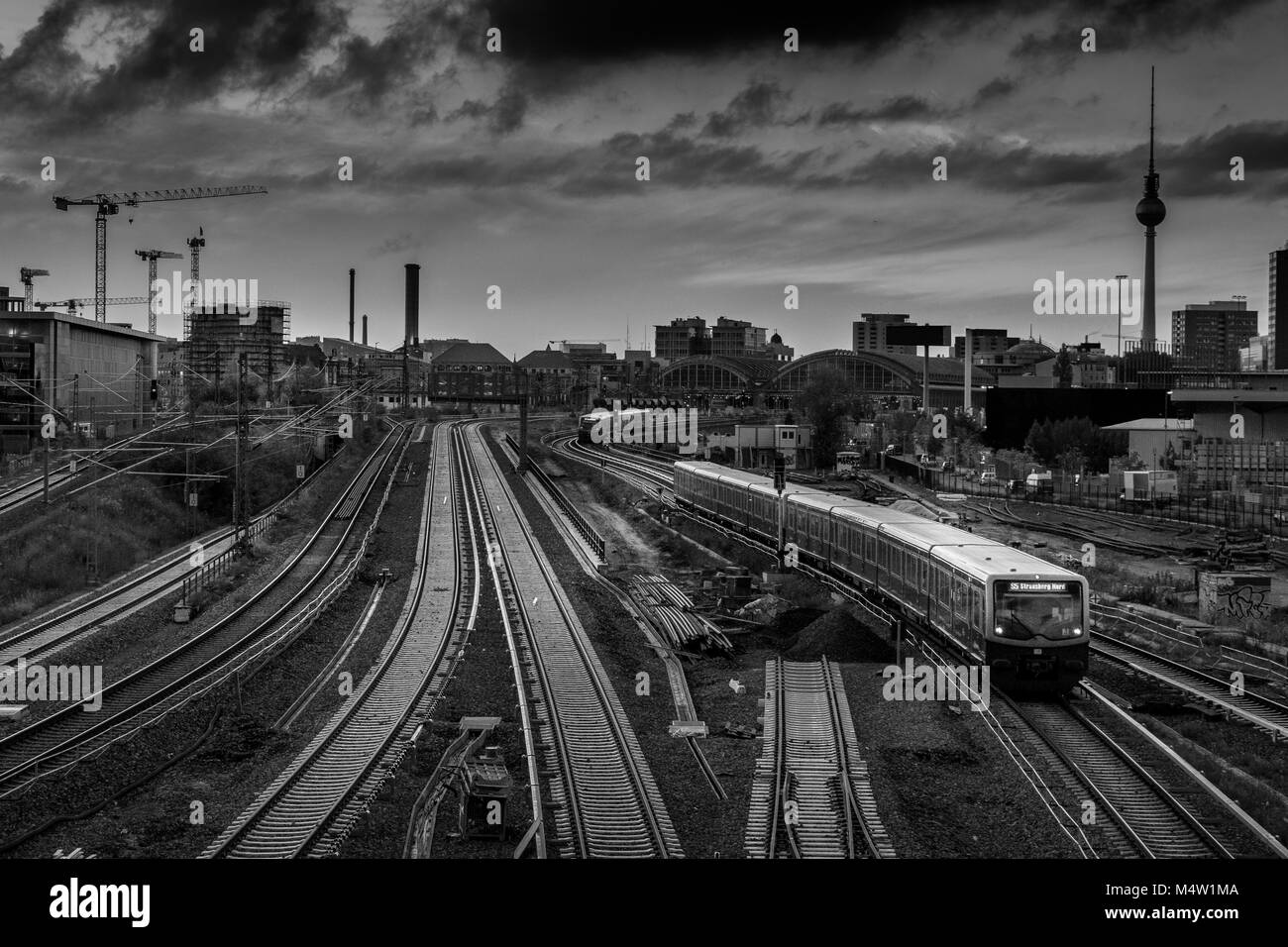 Berlin metro railway tracks with TV Tower in background Stock Photo - Alamy