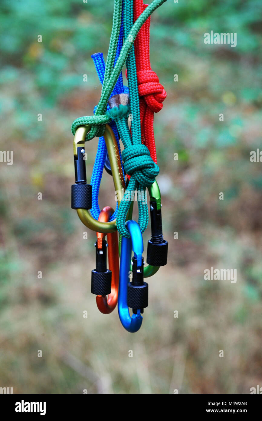 Carabiner with rope on nature background. Climbing uquipment.Climbing ...
