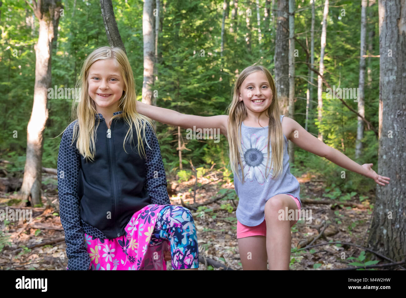 Two girls in the woods hi-res stock photography and images - Alamy