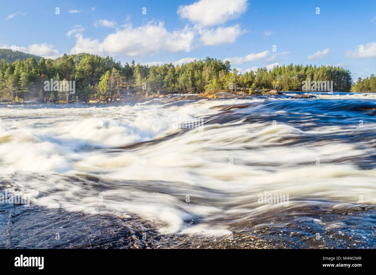 Birkelandsfossen- low waterfall on Otra River in central Norway ...