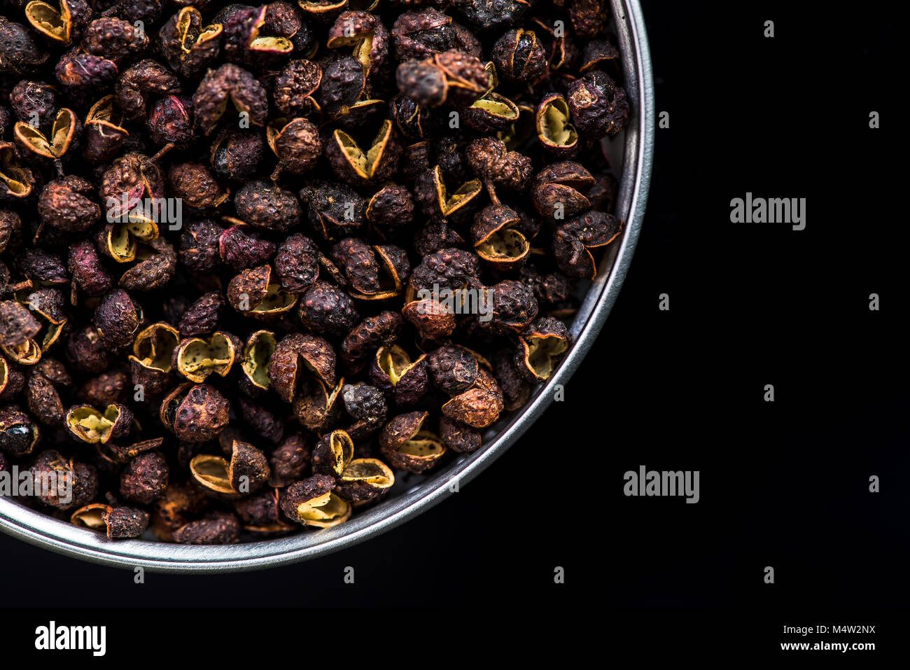 Pot with Timut Nepalese pepper on dark background with copy space Stock ...