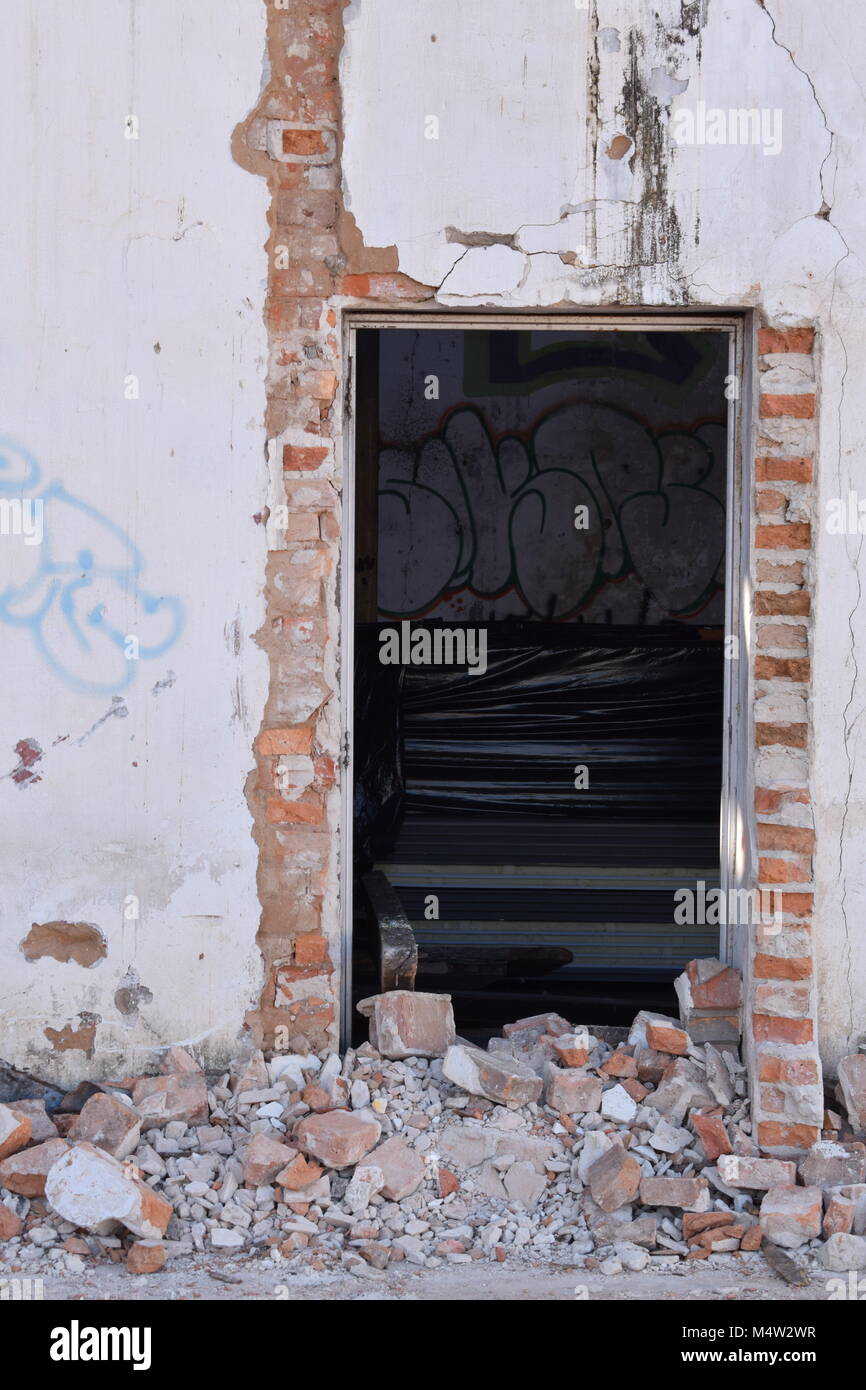 Doors of demolition building Stock Photo - Alamy
