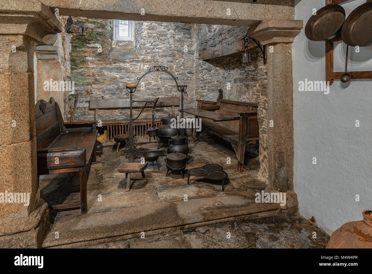 Singular 18th-century stonework kitchen with a striking masonry ...
