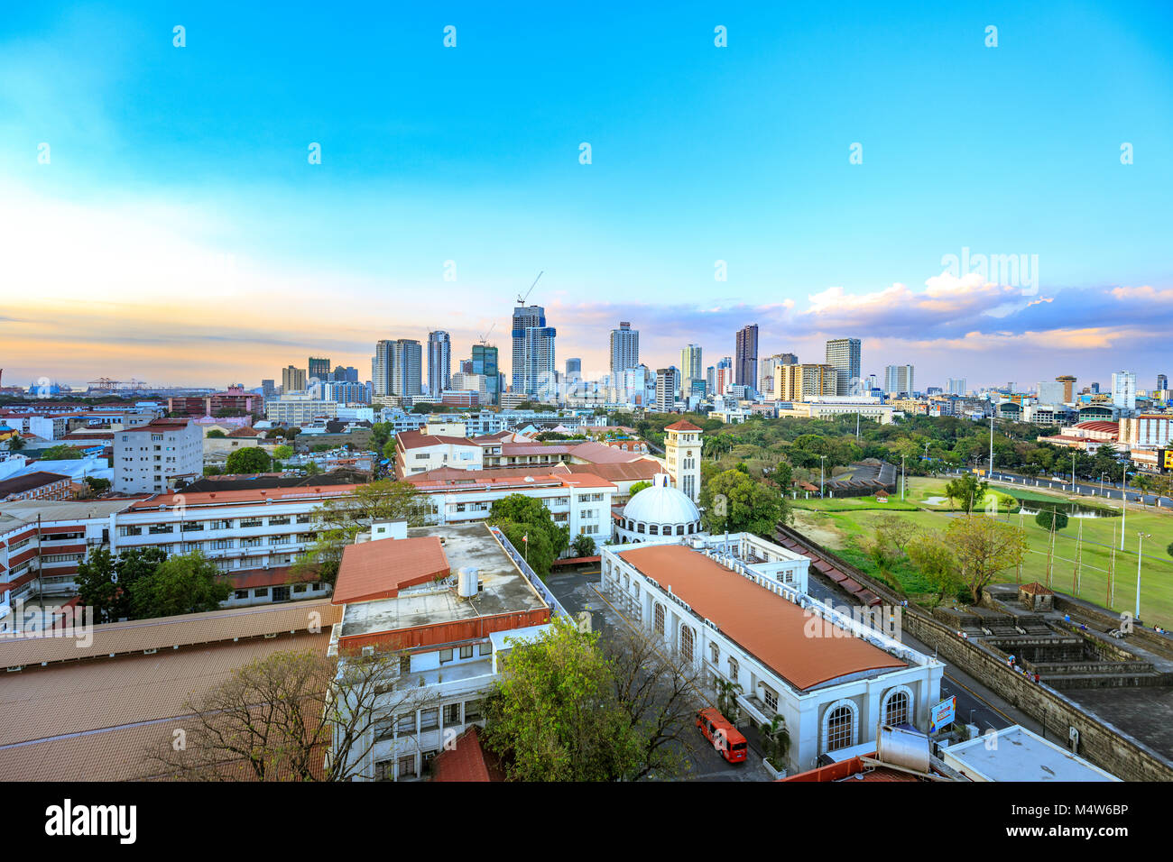 Manila city skyline in Philippines. Seen from Intramuros district Stock ...