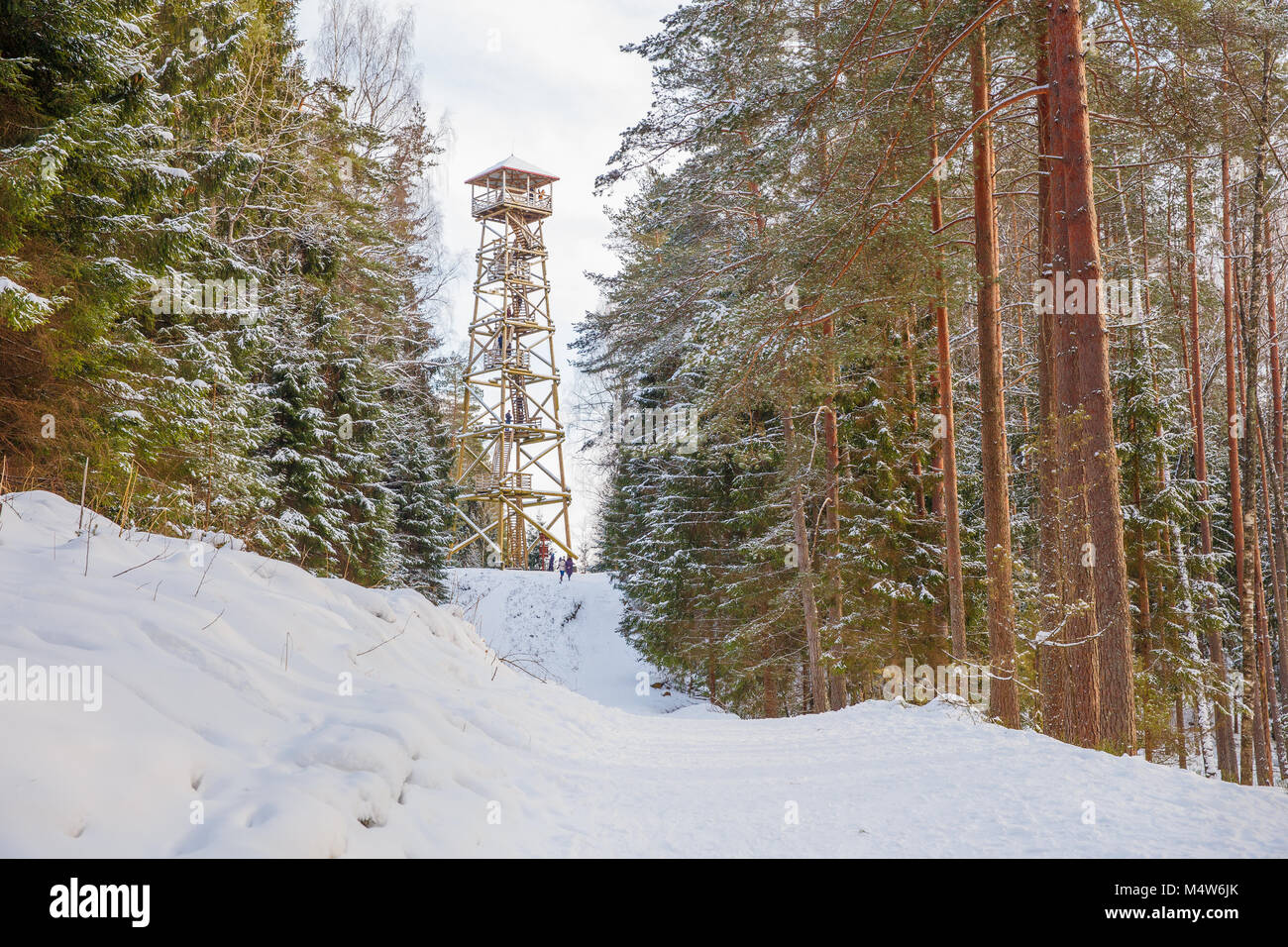 City Ogre, Latvia. Peoples and old sand quarry at city Ogre. Snow and ...