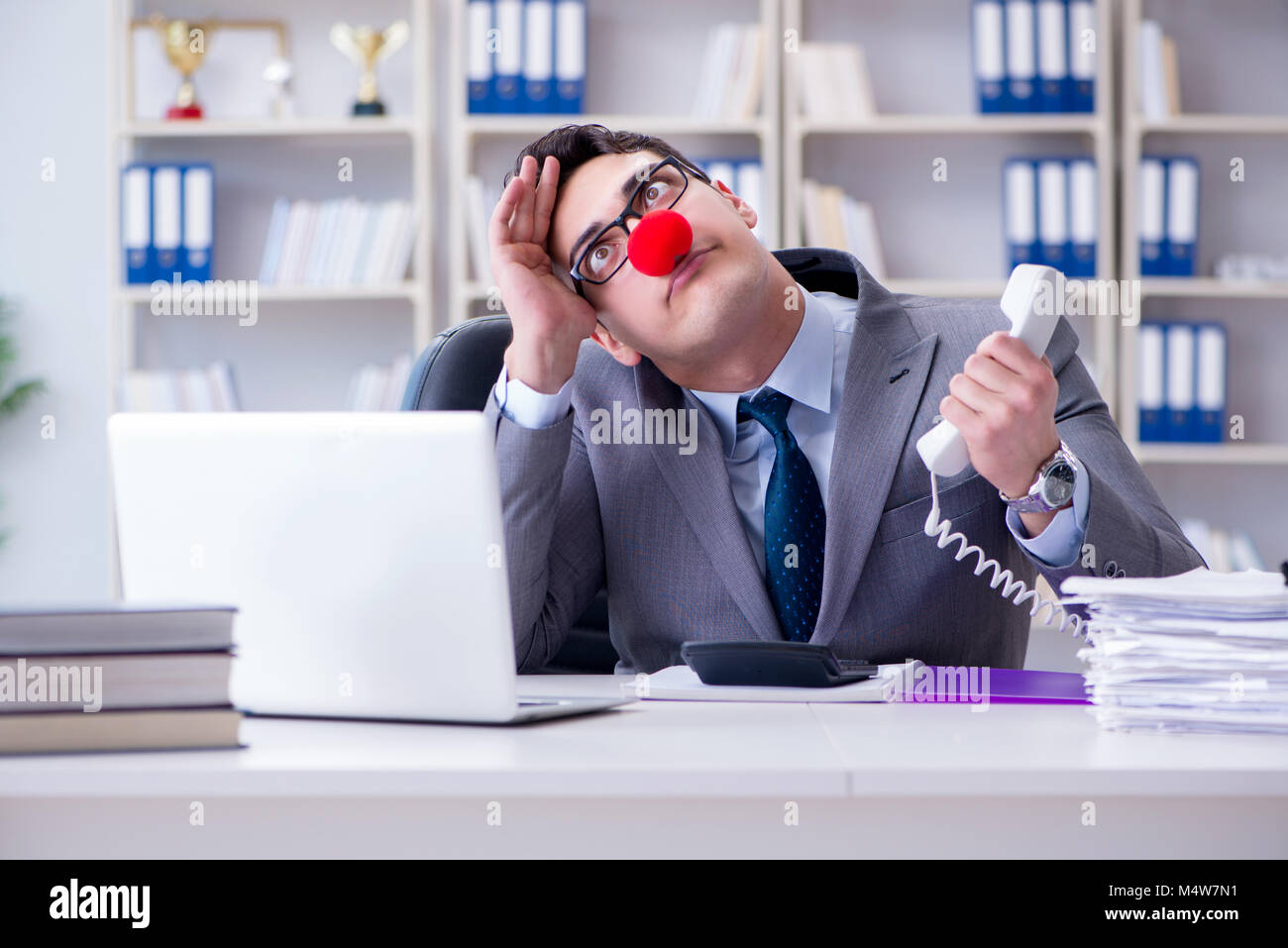Clown businessman angry frustrated working in the office Stock Photo ...