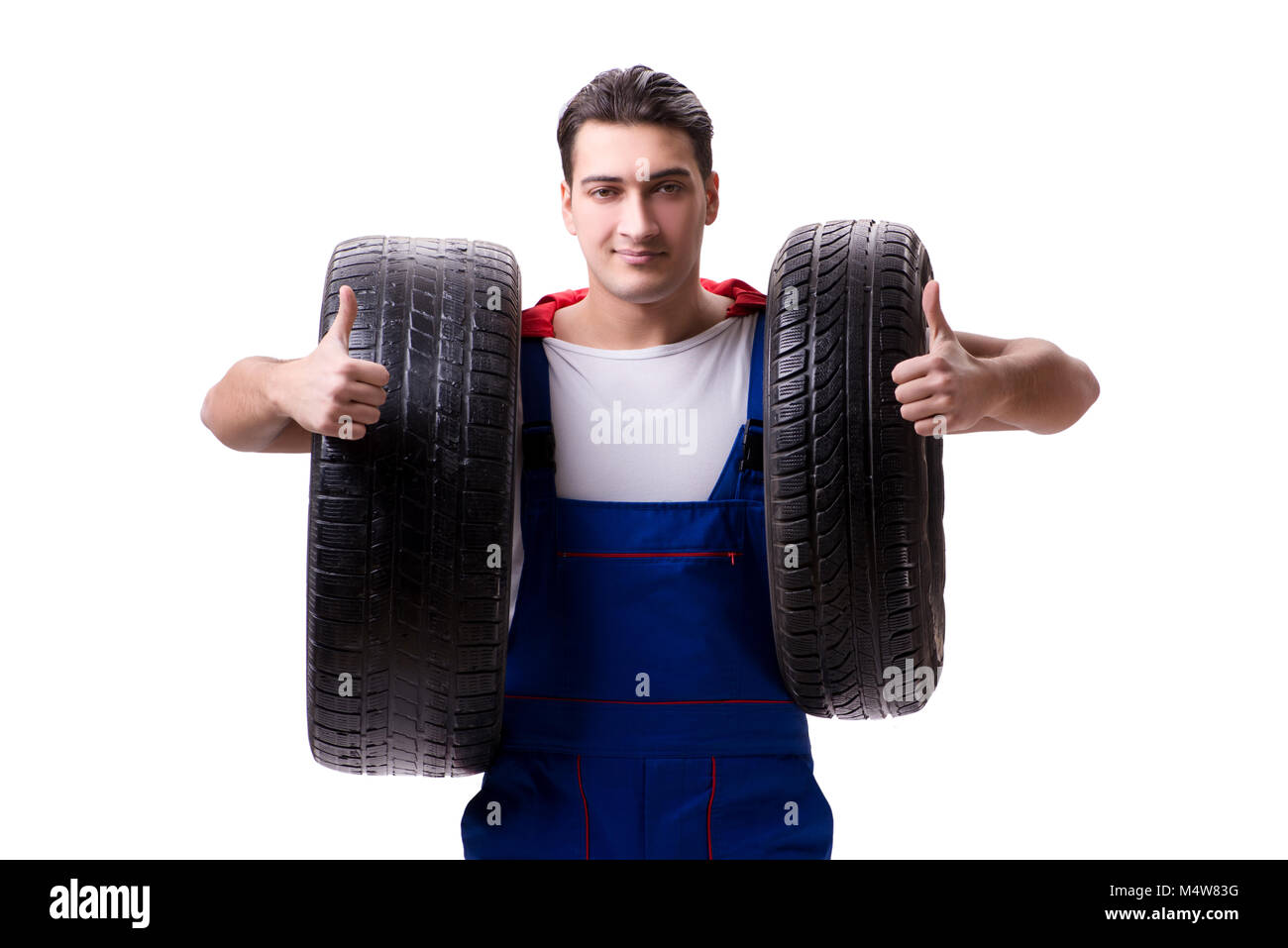 Superhero man with tyre isolated white background Stock Photo - Alamy