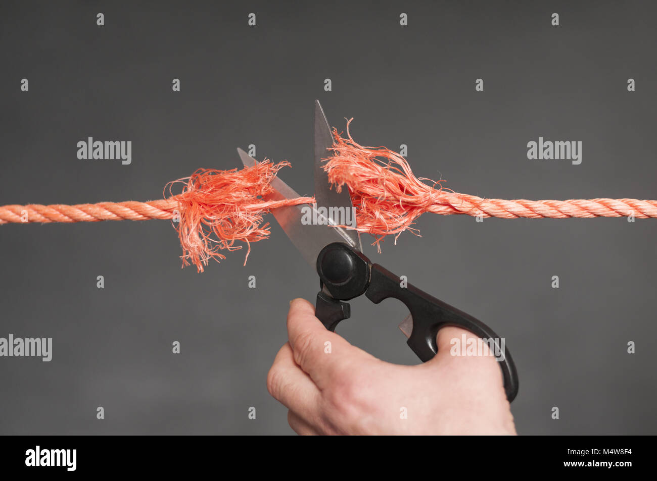 Cutting rope hi-res stock photography and images - Alamy