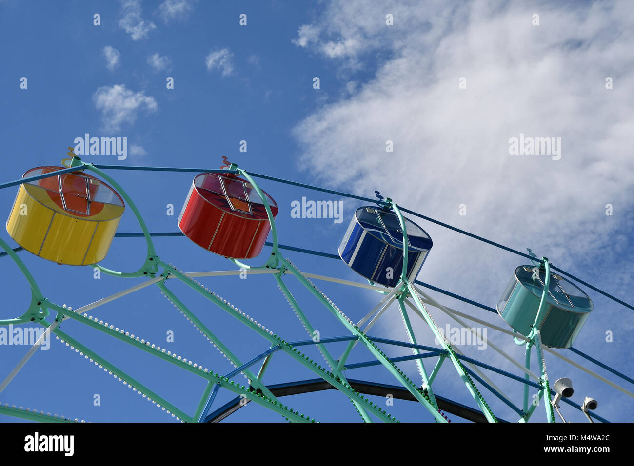 Ferris wheel in a summer amusement park Stock Photo - Alamy