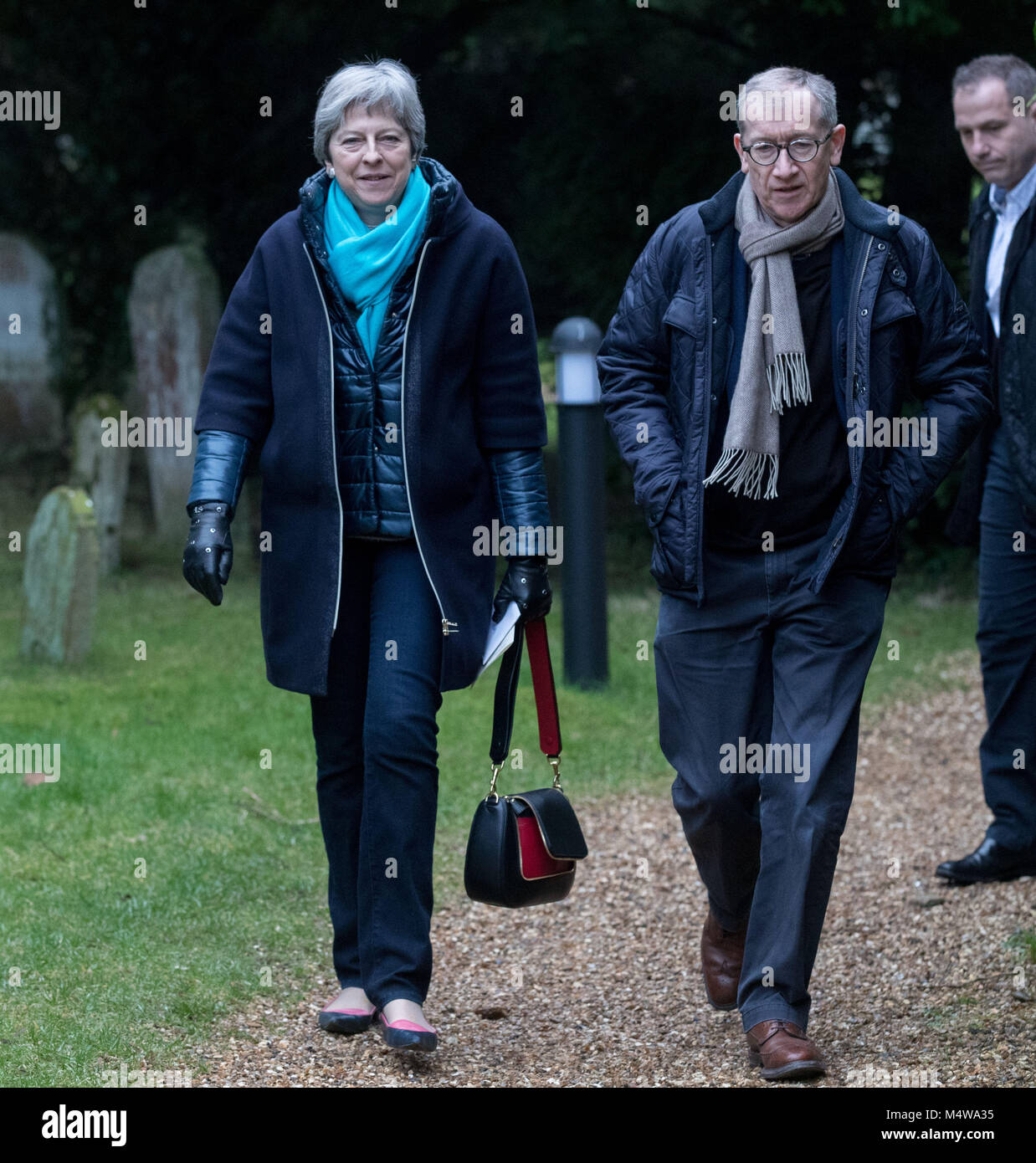 Prime Minister Theresa May and her husband Philip arrive to attend a ...