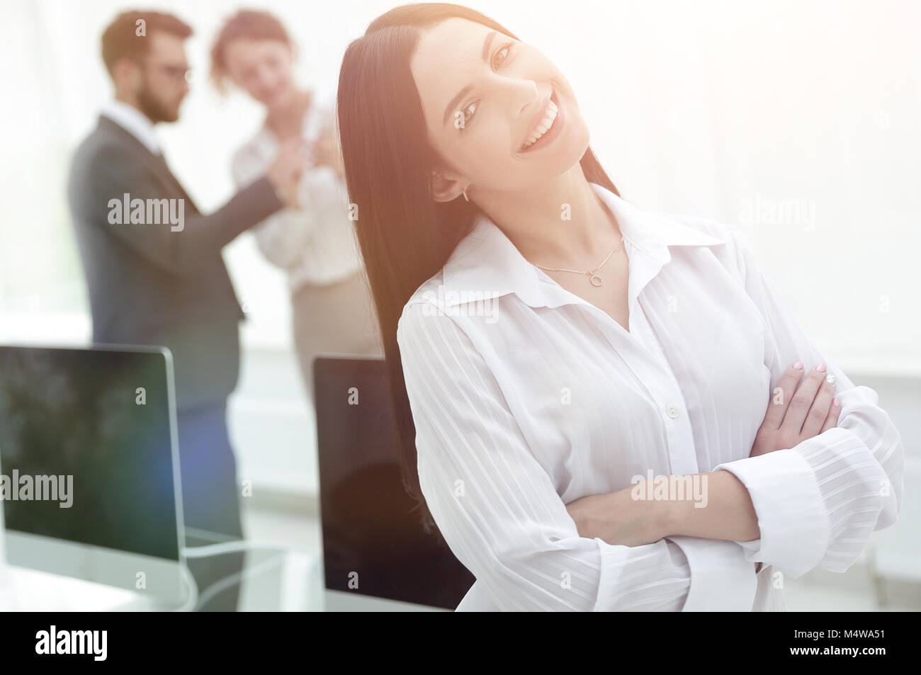 successful young business woman on the background of a workplace Stock ...