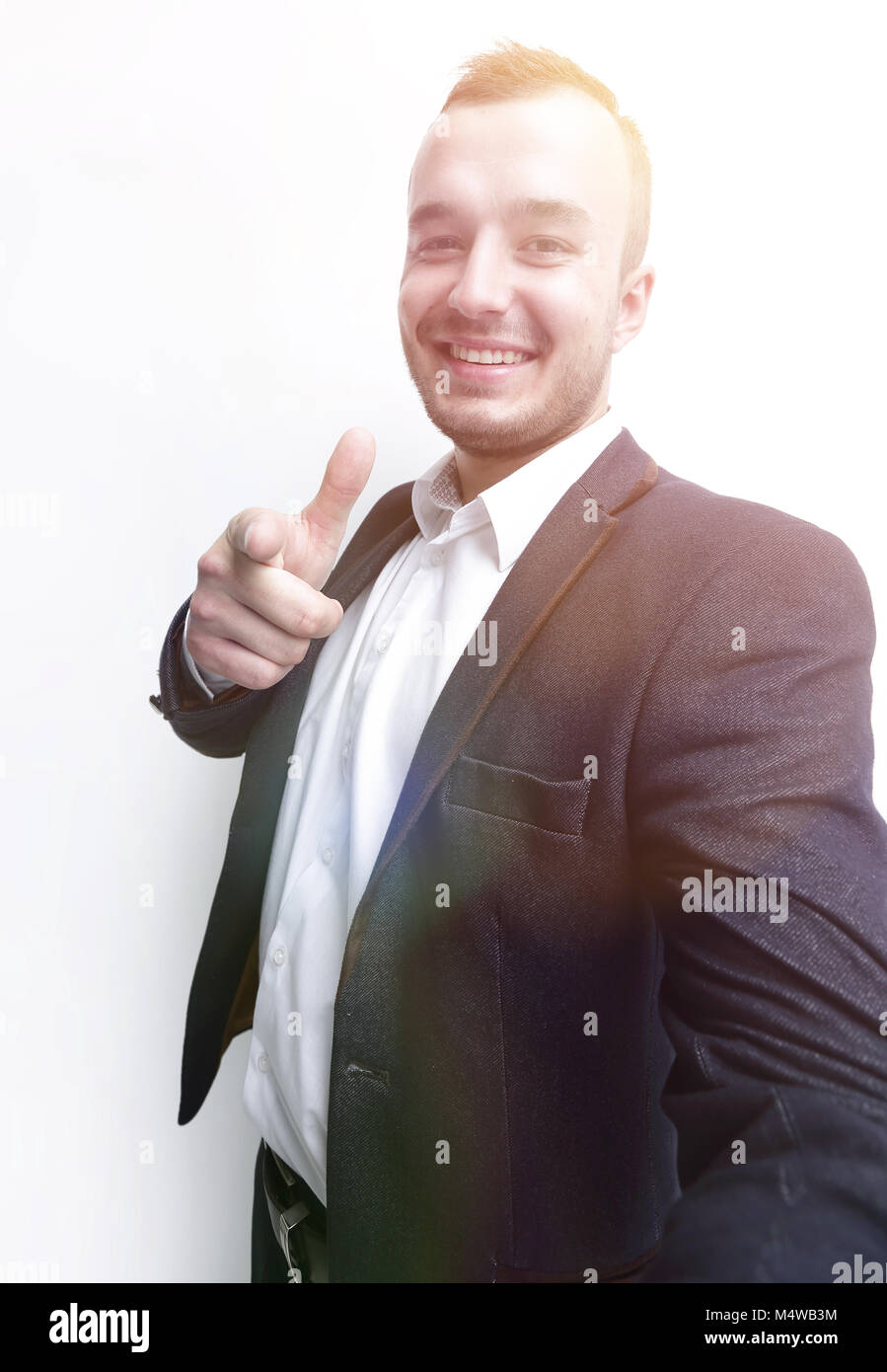 Happy successful businessman pointing on copy space Stock Photo - Alamy