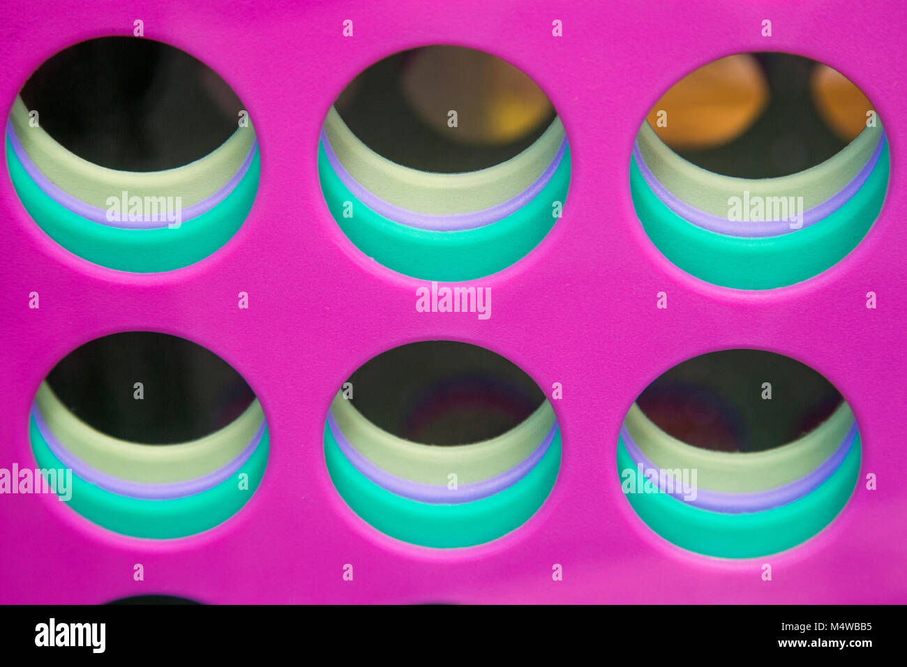 Plastic abstract with circular holes and coloured layers Stock Photo ...