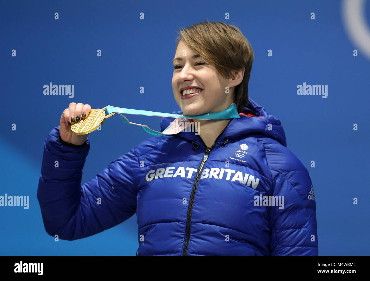 Great Britain's Lizzy Yarnold poses with her gold medal during the ...