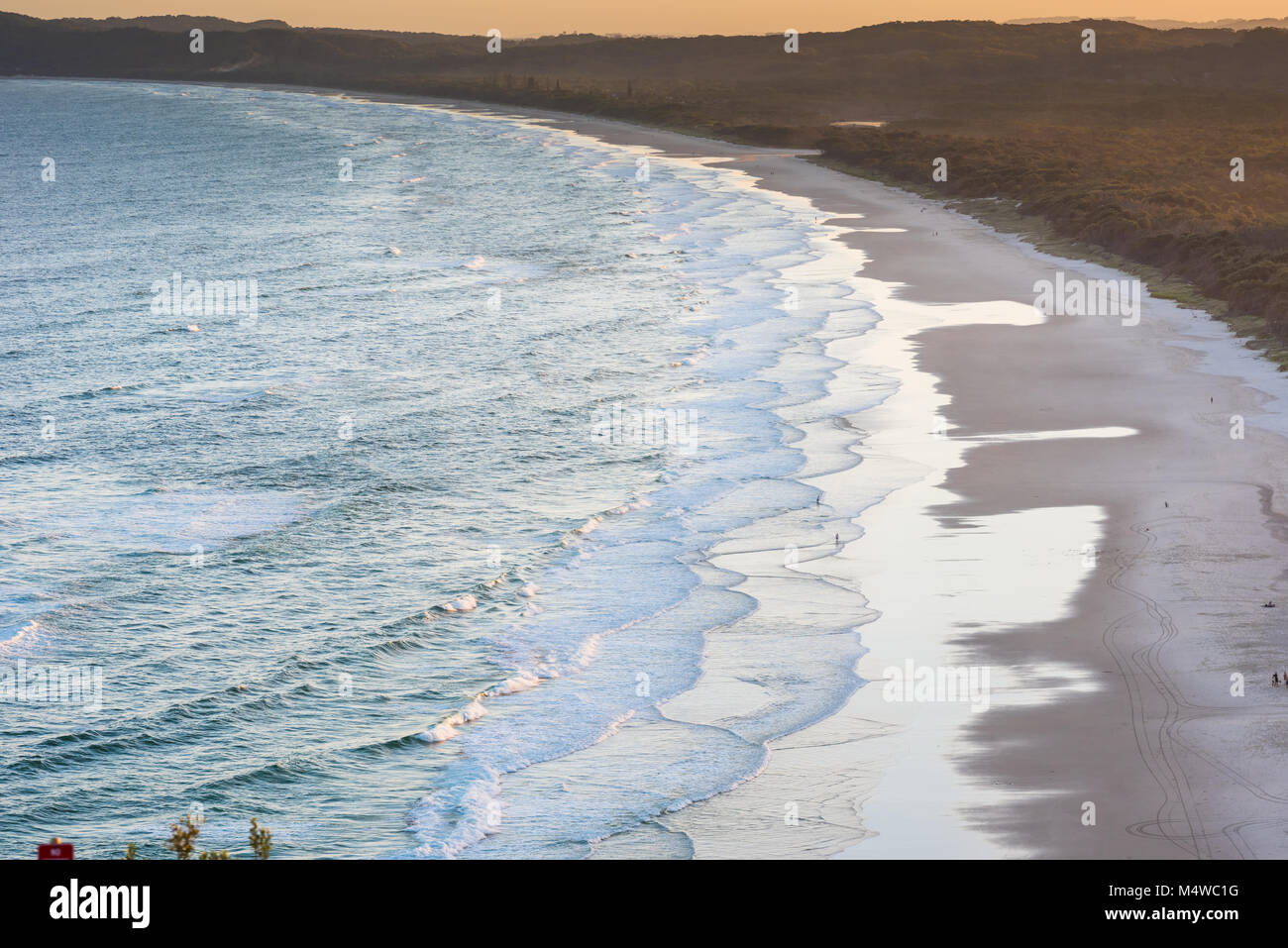 Looking from Byron Bay Lighthouse over the southern beach as fishermen ...
