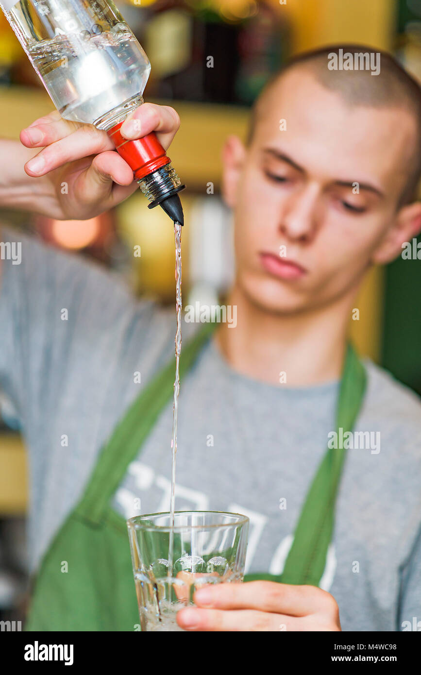 Bartender mixing a cocktail Stock Photo - Alamy