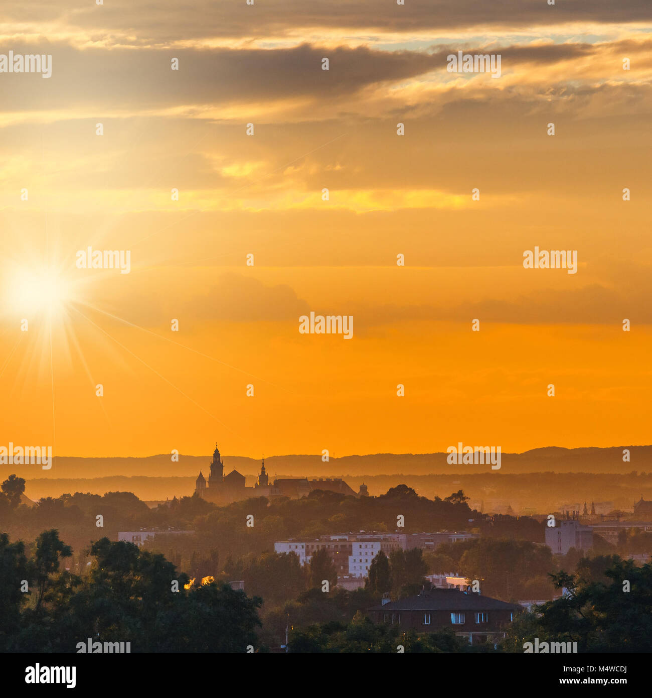 amazing sunset over Wawel Castle in Krakow, Poland Stock Photo - Alamy