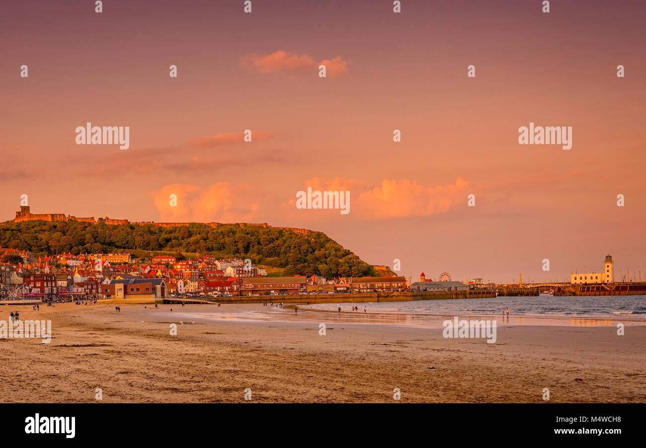 Summer evening on the beach as the holidaymaker head for home. A ...
