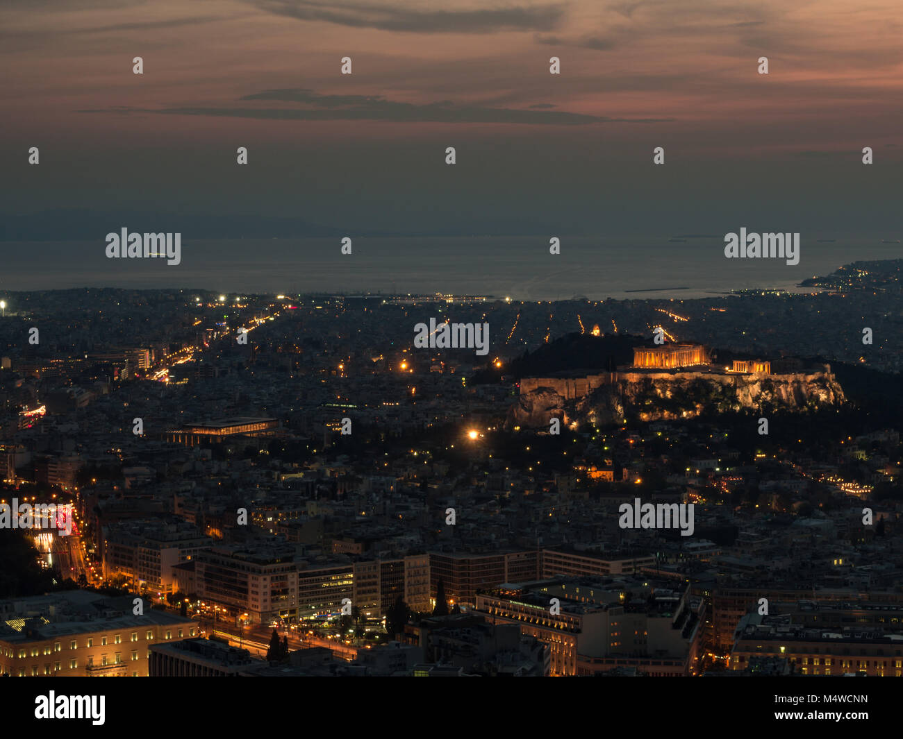 Athens cityscape with Acropolis at sunset Stock Photo - Alamy