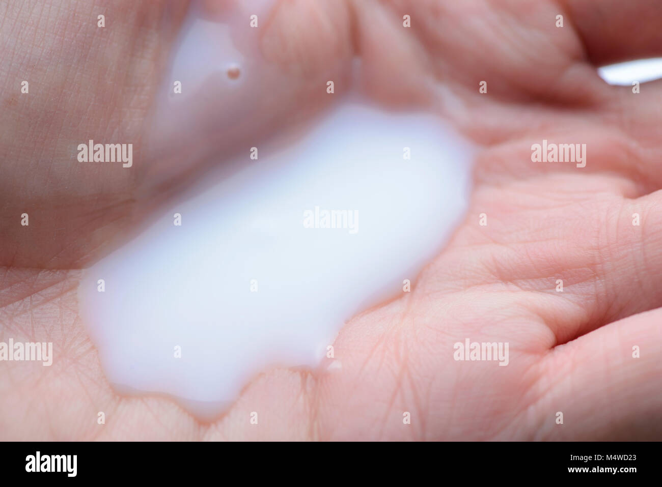Man hand with liquid soap on hands Stock Photo - Alamy