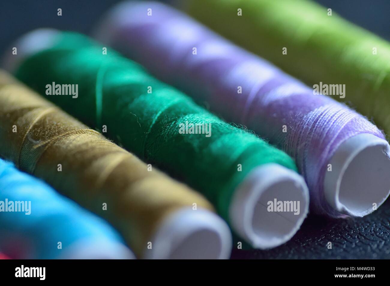 Macro background texture of colorful sewing threads Stock Photo - Alamy