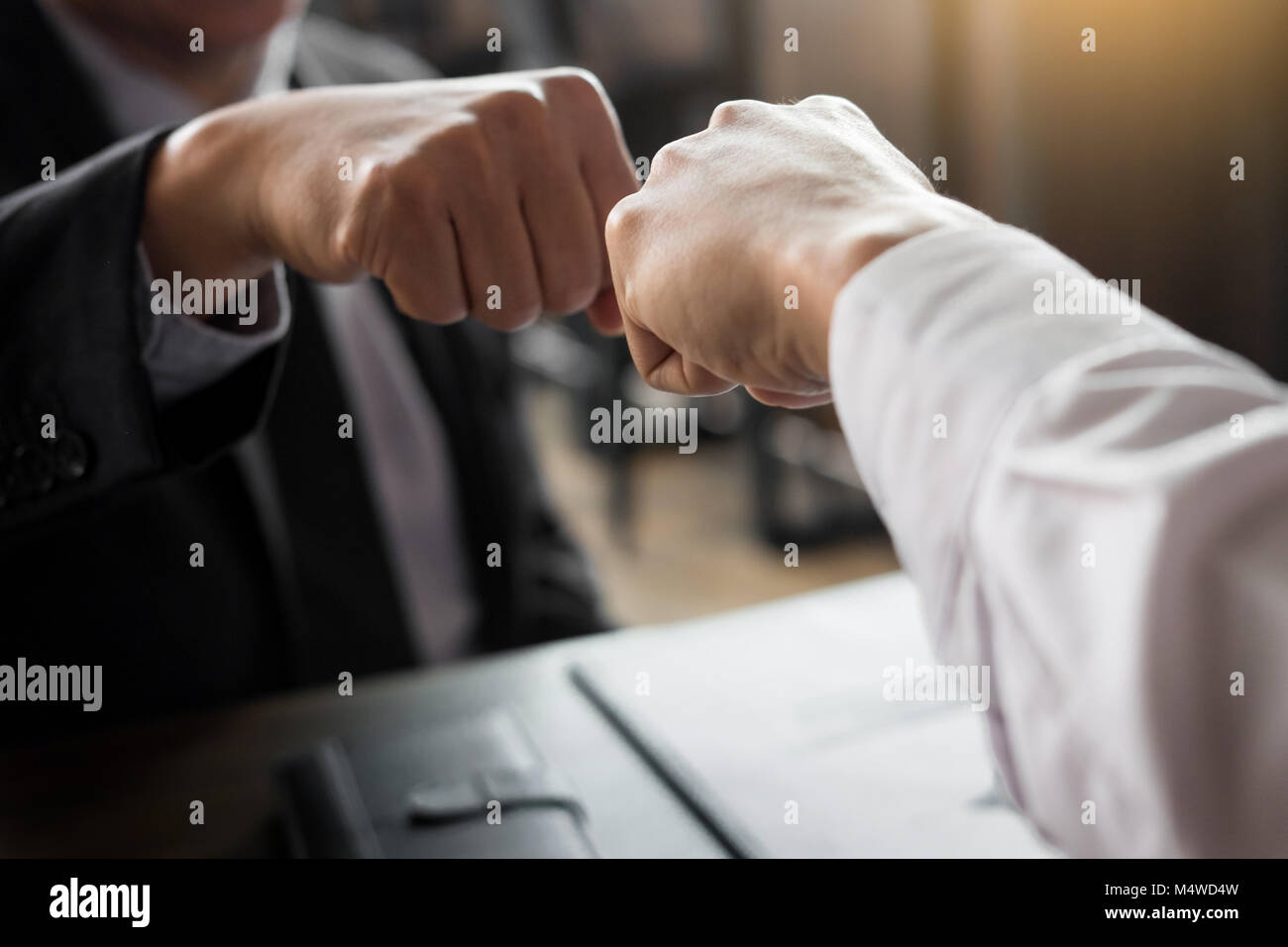 Business Partners Giving Fist Bump to commitment Greeting Start up new ...