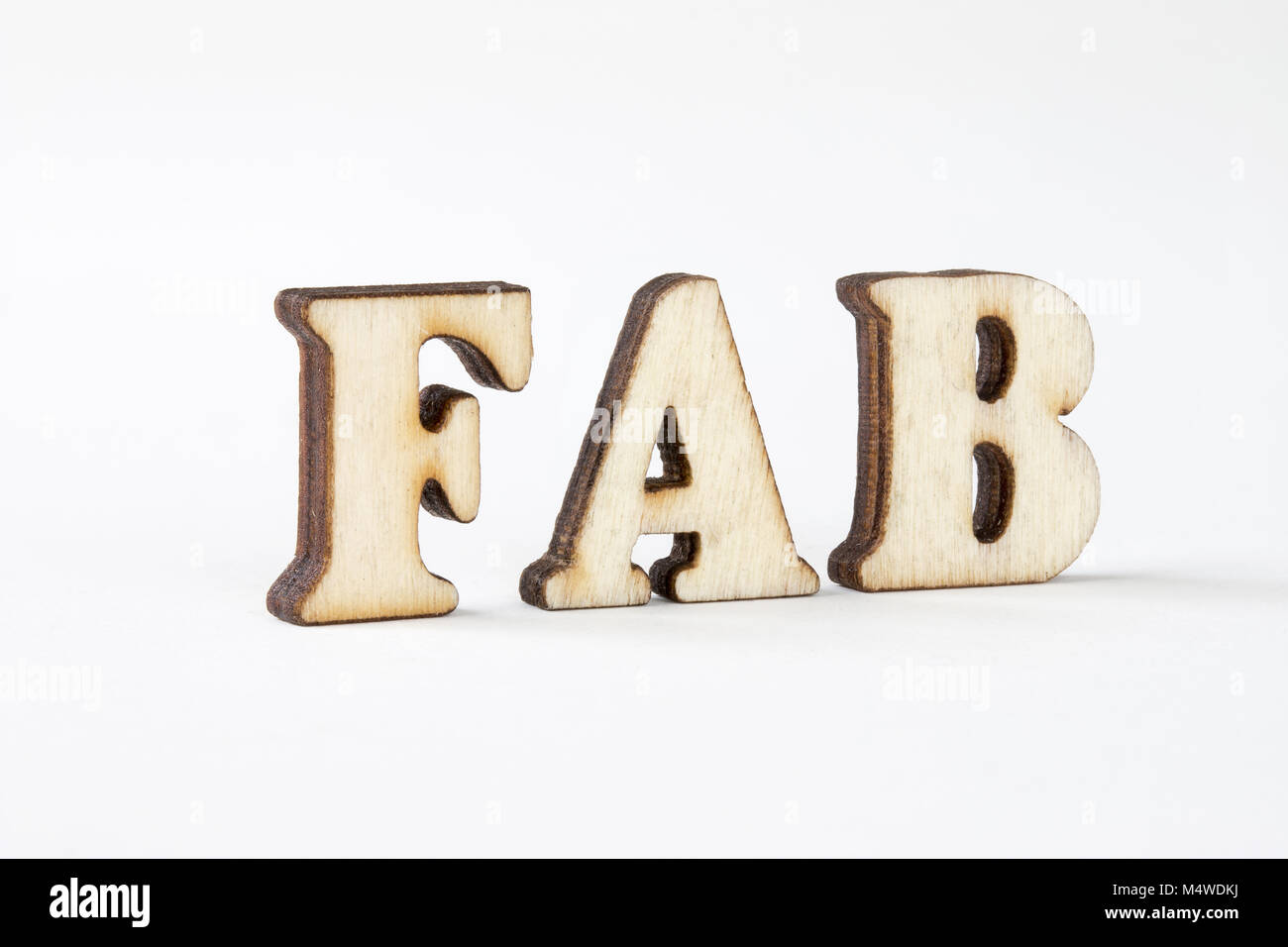 FAB, Wood letters FAB on White background,fabulous Stock Photo - Alamy