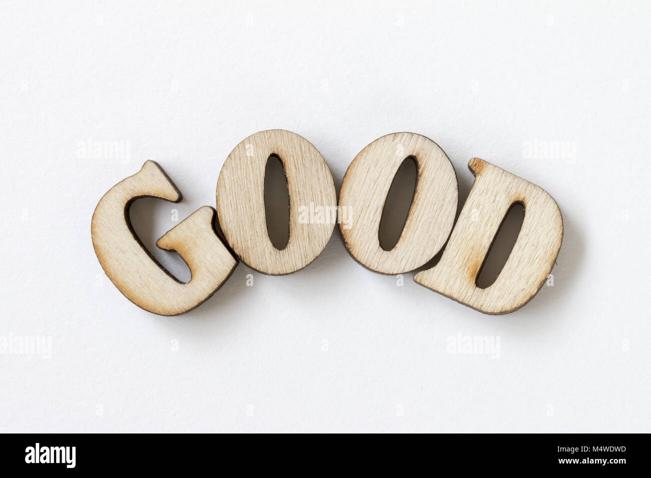 GOOD, Wood letters good on White background Stock Photo - Alamy
