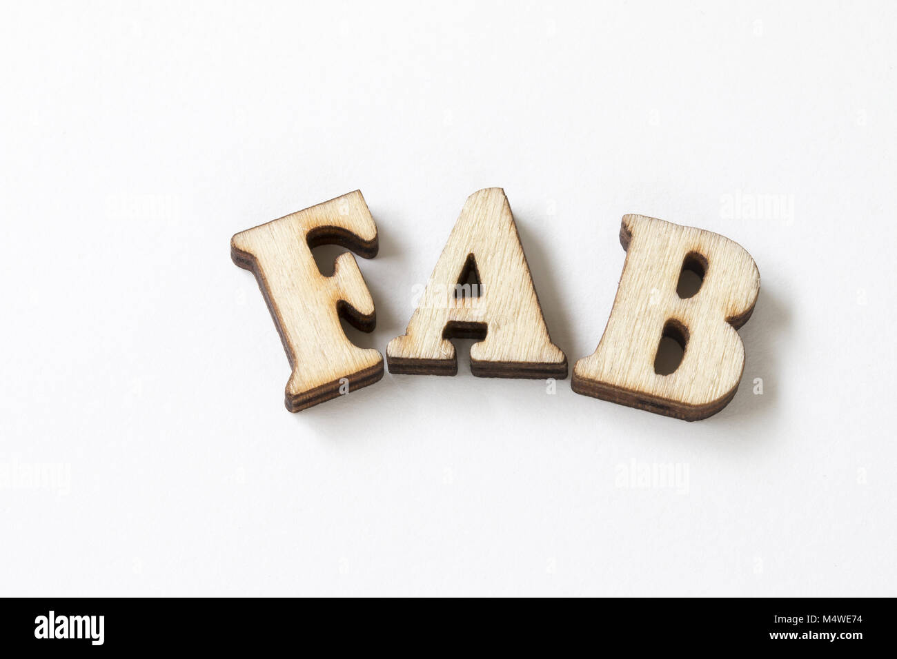 FAB, Wood letters FAB on White background,fabulous Stock Photo - Alamy