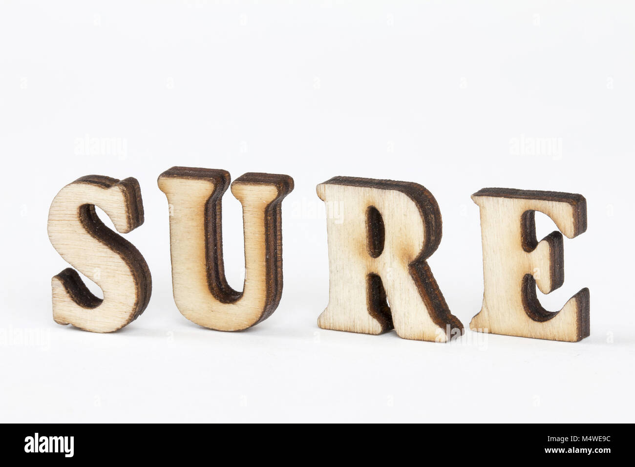 sure, Wood letters SURE on White background Stock Photo - Alamy