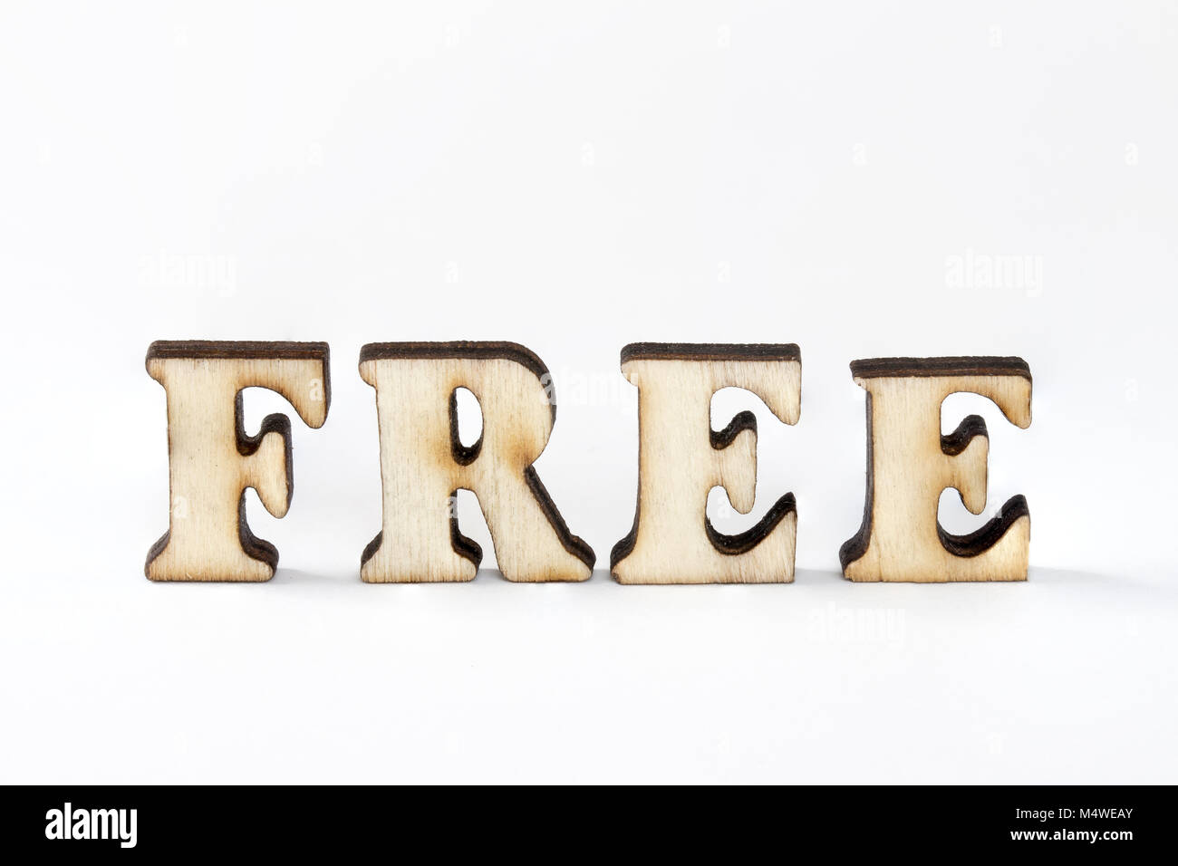 free, Wood letters FREE on White background Stock Photo - Alamy