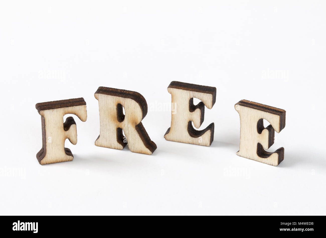 free, Wood letters FREE on White background Stock Photo - Alamy