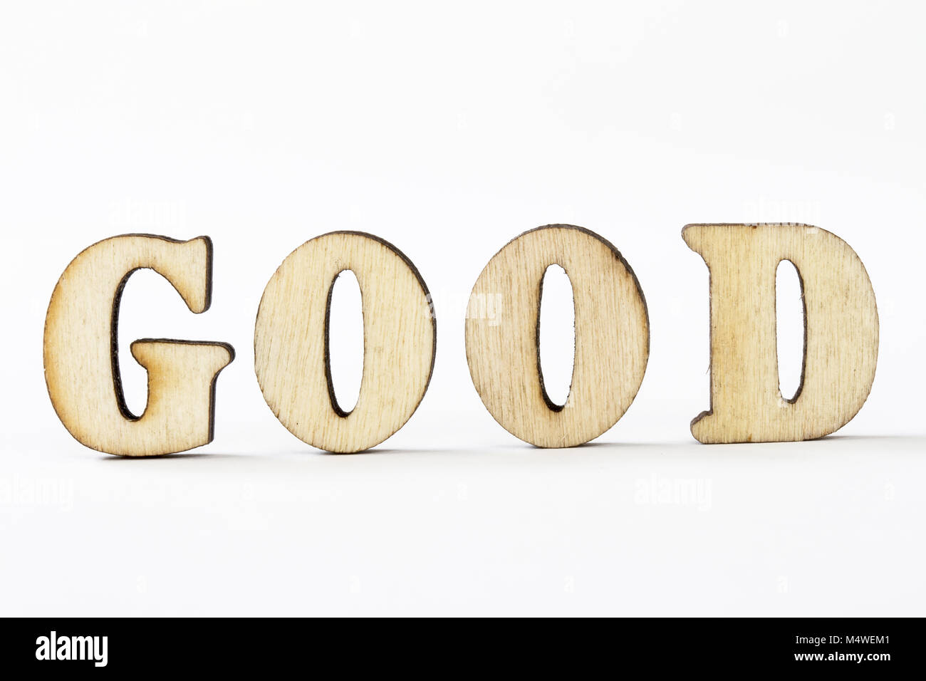 GOOD, Wood letters good on White background Stock Photo - Alamy