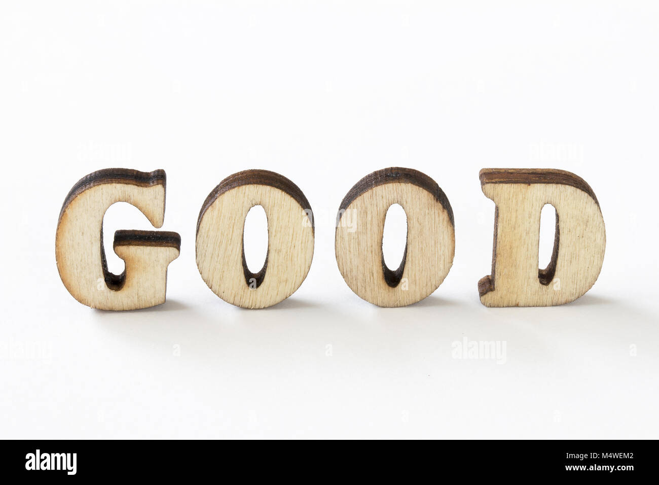 GOOD, Wood letters good on White background Stock Photo - Alamy