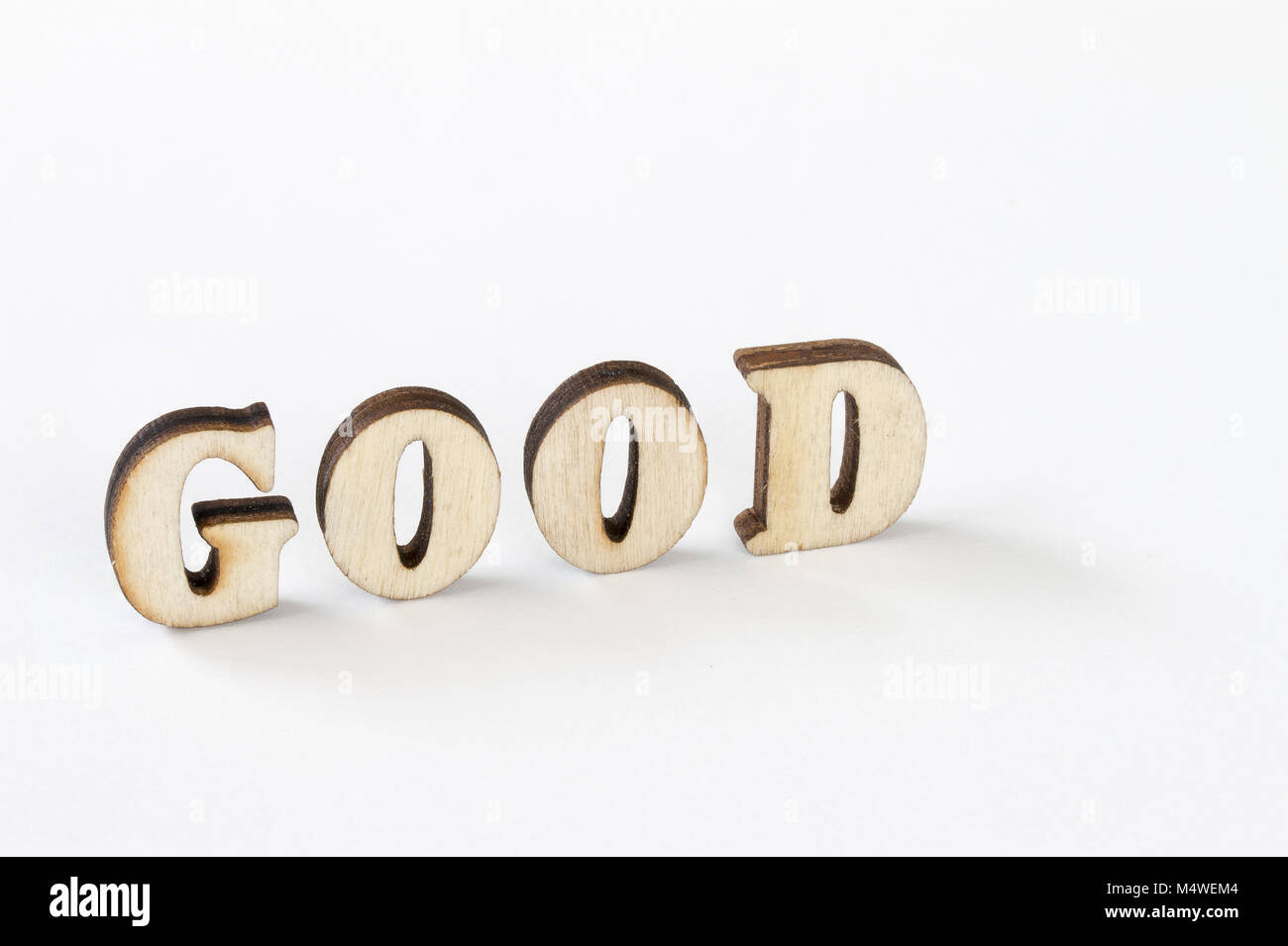 GOOD, Wood letters good on White background Stock Photo - Alamy