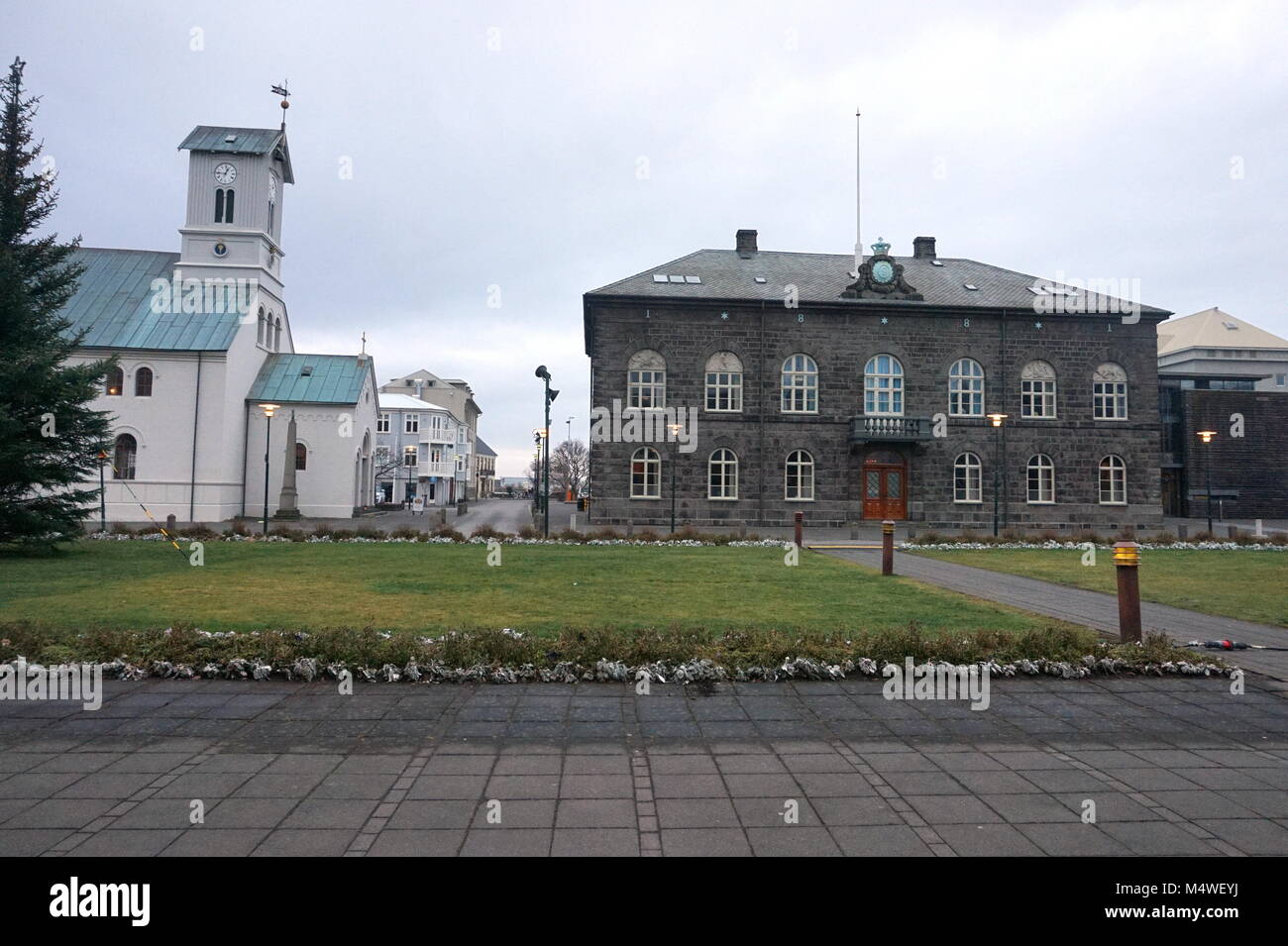 Austurvöllur Park with Alþingishúsið, the Icelandic Parliament House ...