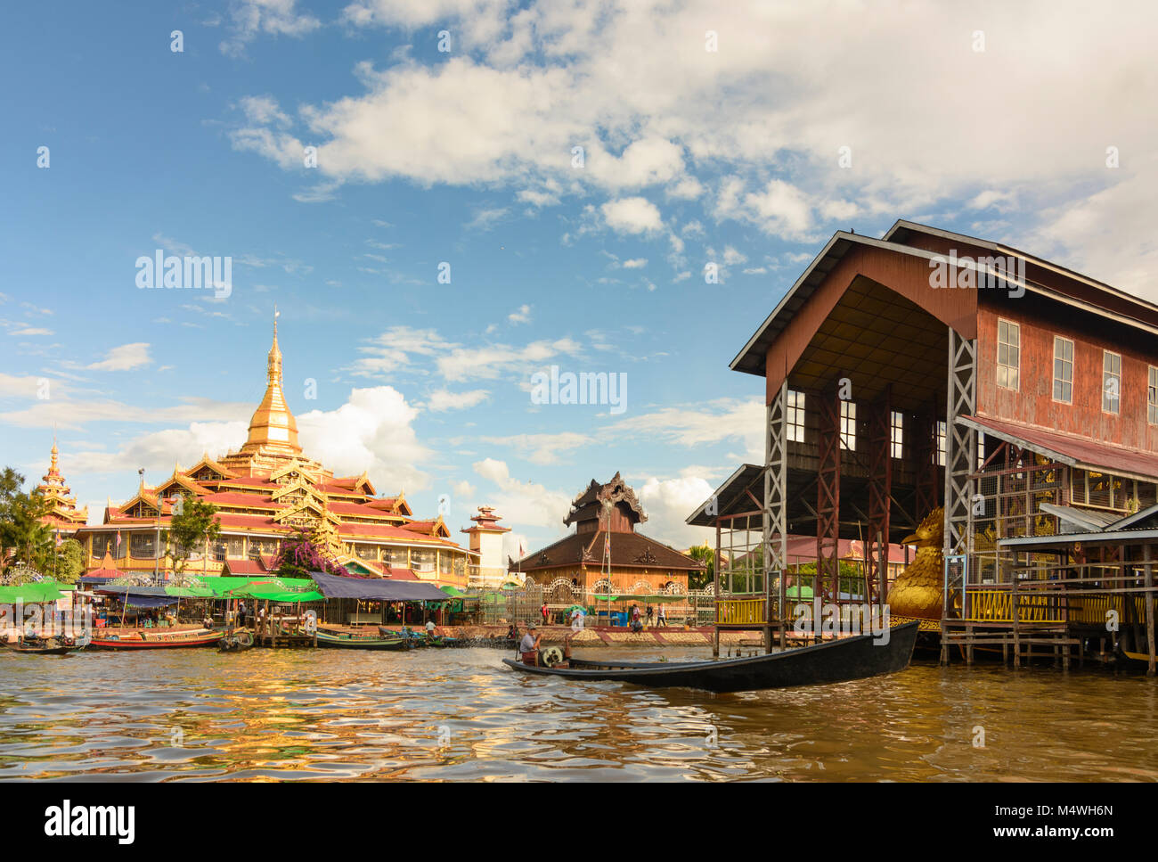 Tha Lay: temple pagoda Phaung Daw Oo Paya, boat, canal, boat house of ...