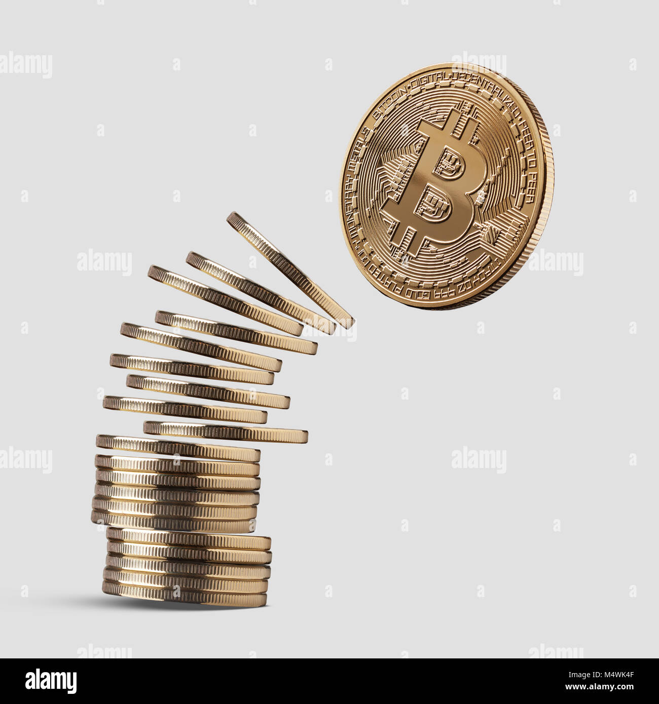 Disintegrate stick coin bitcoin on a gray background Stock Photo - Alamy