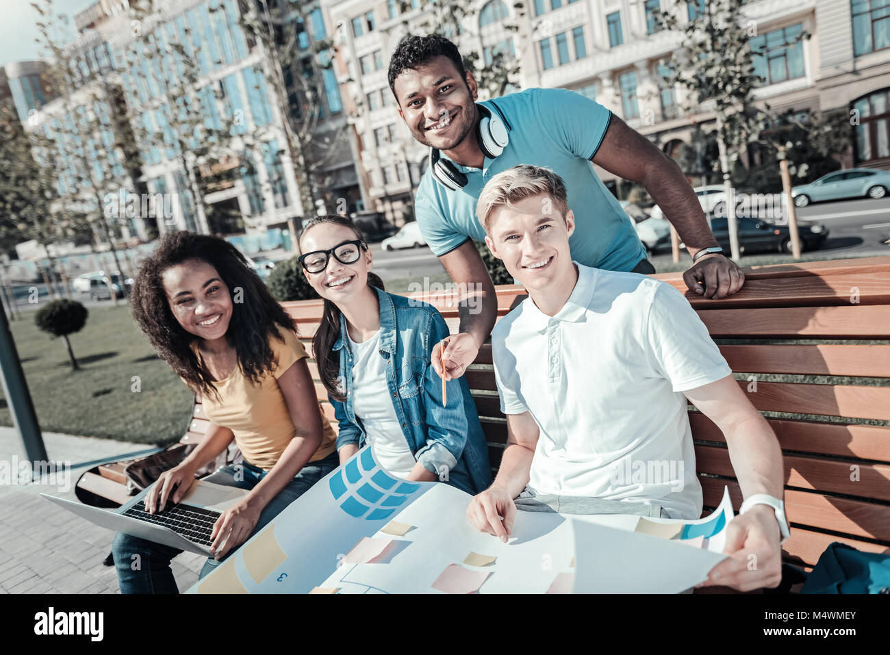 Positive cheerful students looking at you Stock Photo - Alamy