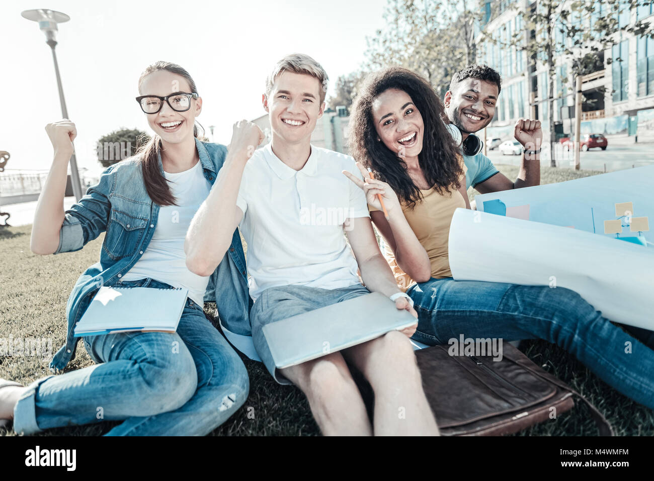 Positive nice students expressing their emotions Stock Photo - Alamy