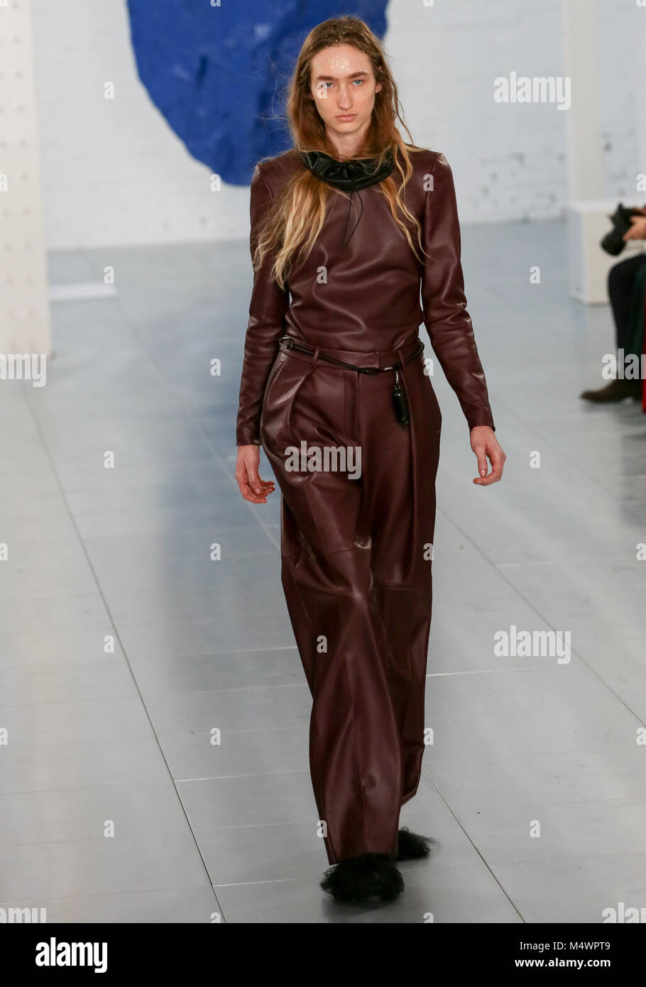 London, UK. 18th Feb, 2018. A model walk the runway at the Preen by ...