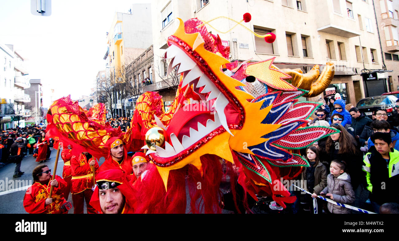 Madrid, Spain. 18th February, 2018. People with two colorfull dragons ...