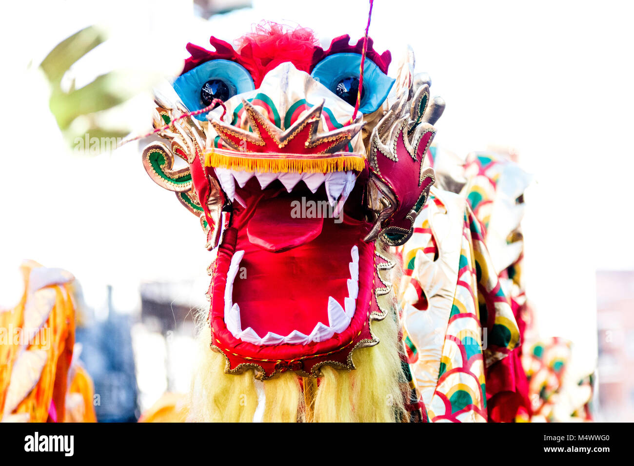 Madrid, Spain. 18th February, 2018. People with two colorfull dragons ...