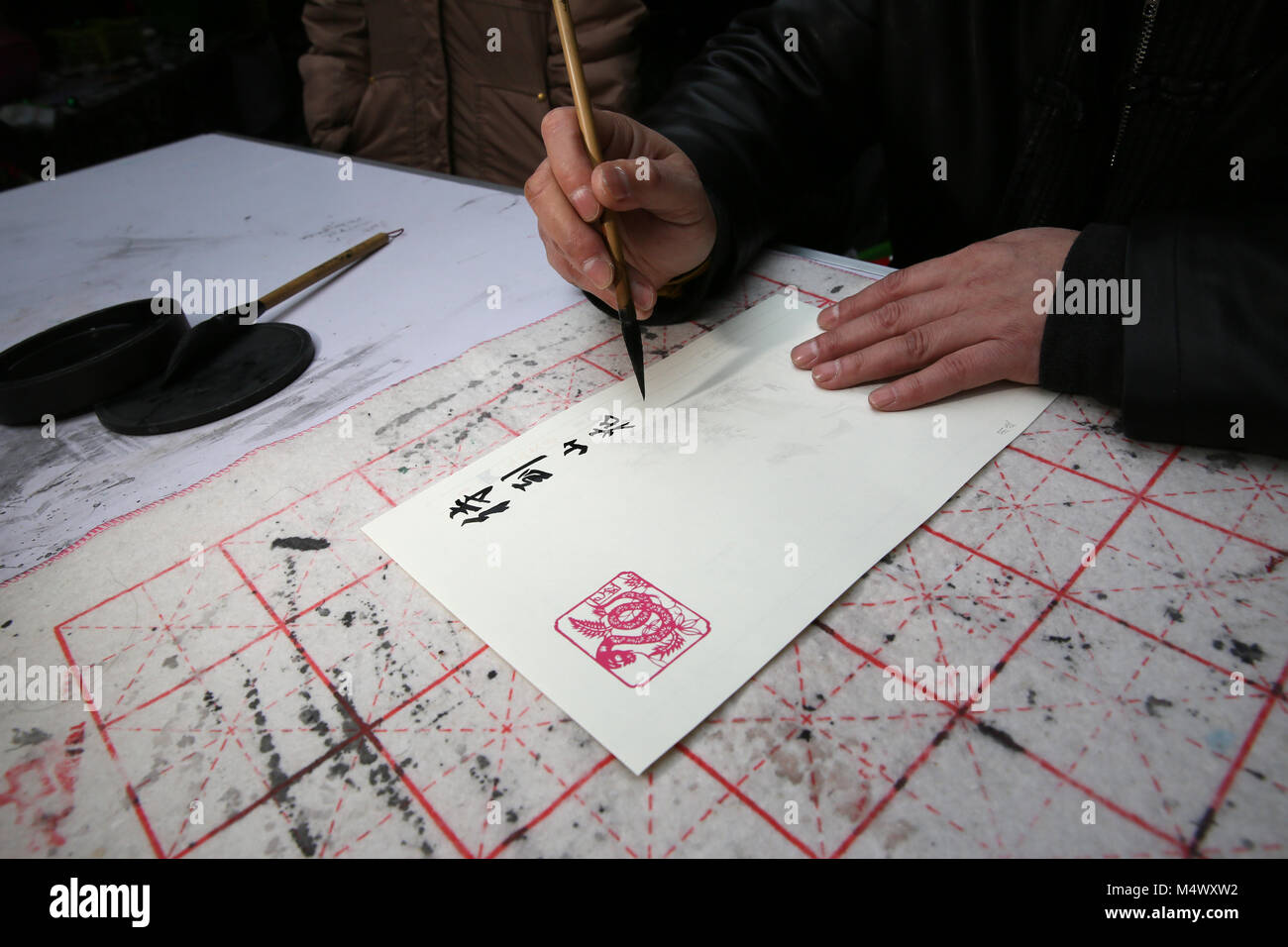 An ink pen been used to write in calligraphy, Chinatown, Manchester ...